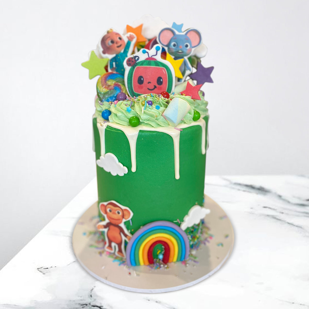 CoComelon Drip Cake – The Cupcake Factory