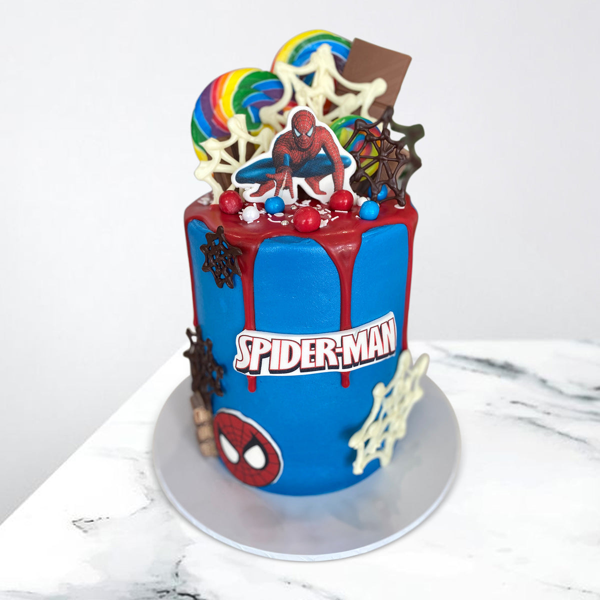 Spiderman Drip Cake – The Cupcake Factory