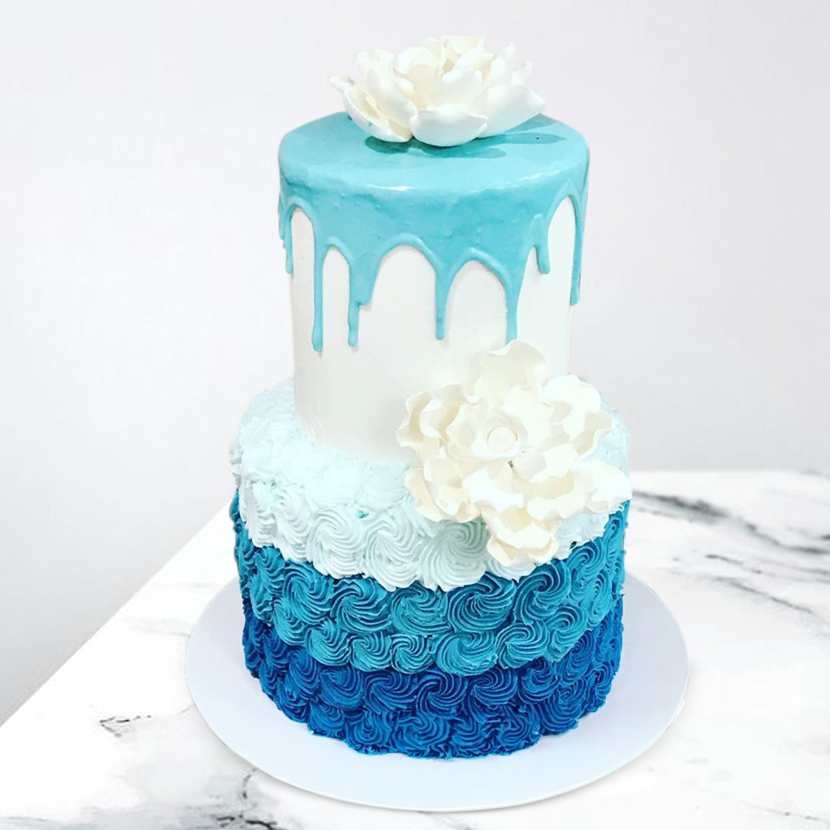 Two Tier Blue Swirl Cake – The Cupcake Factory