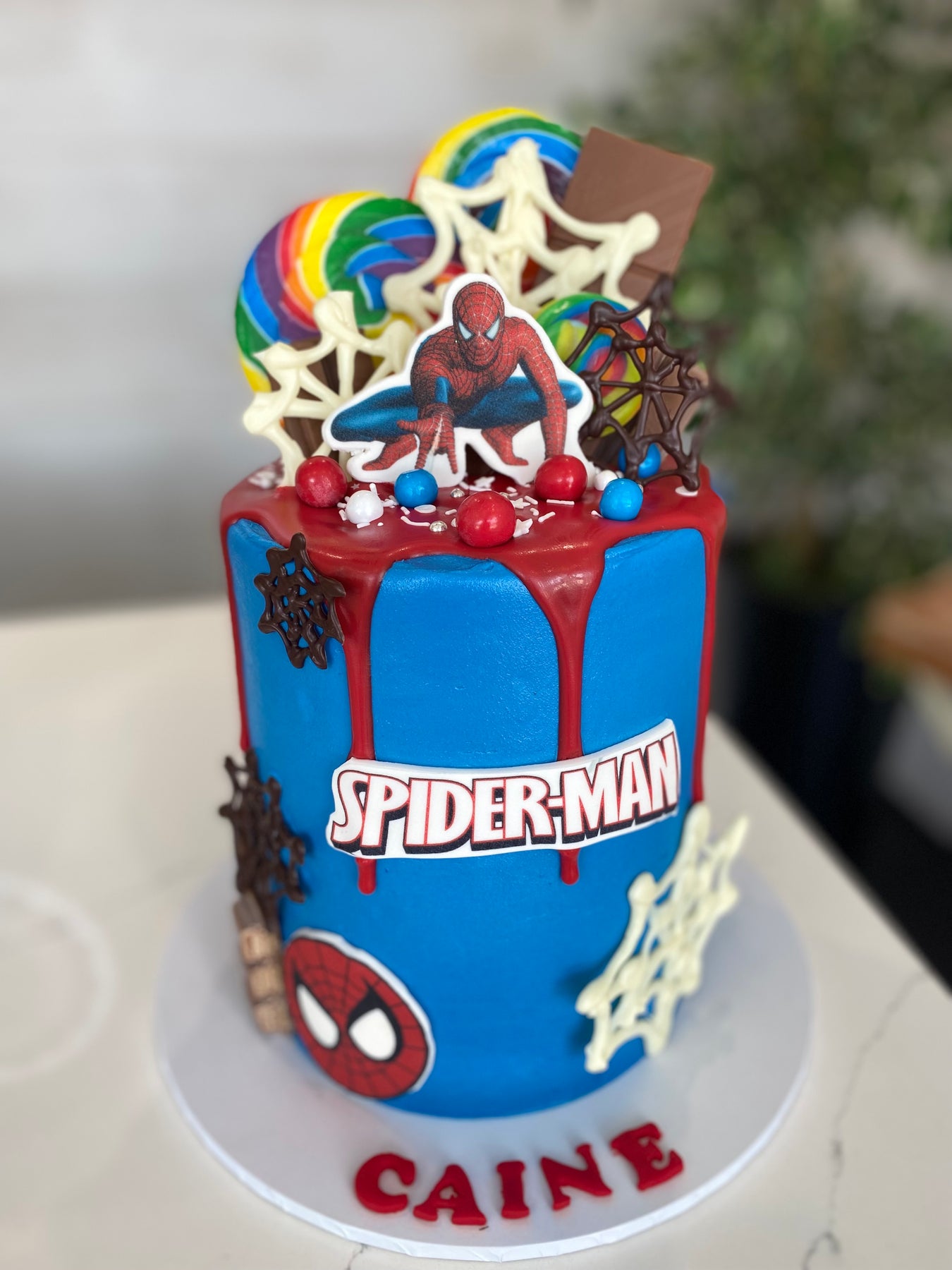 Spiderman Drip Cake – The Cupcake Factory