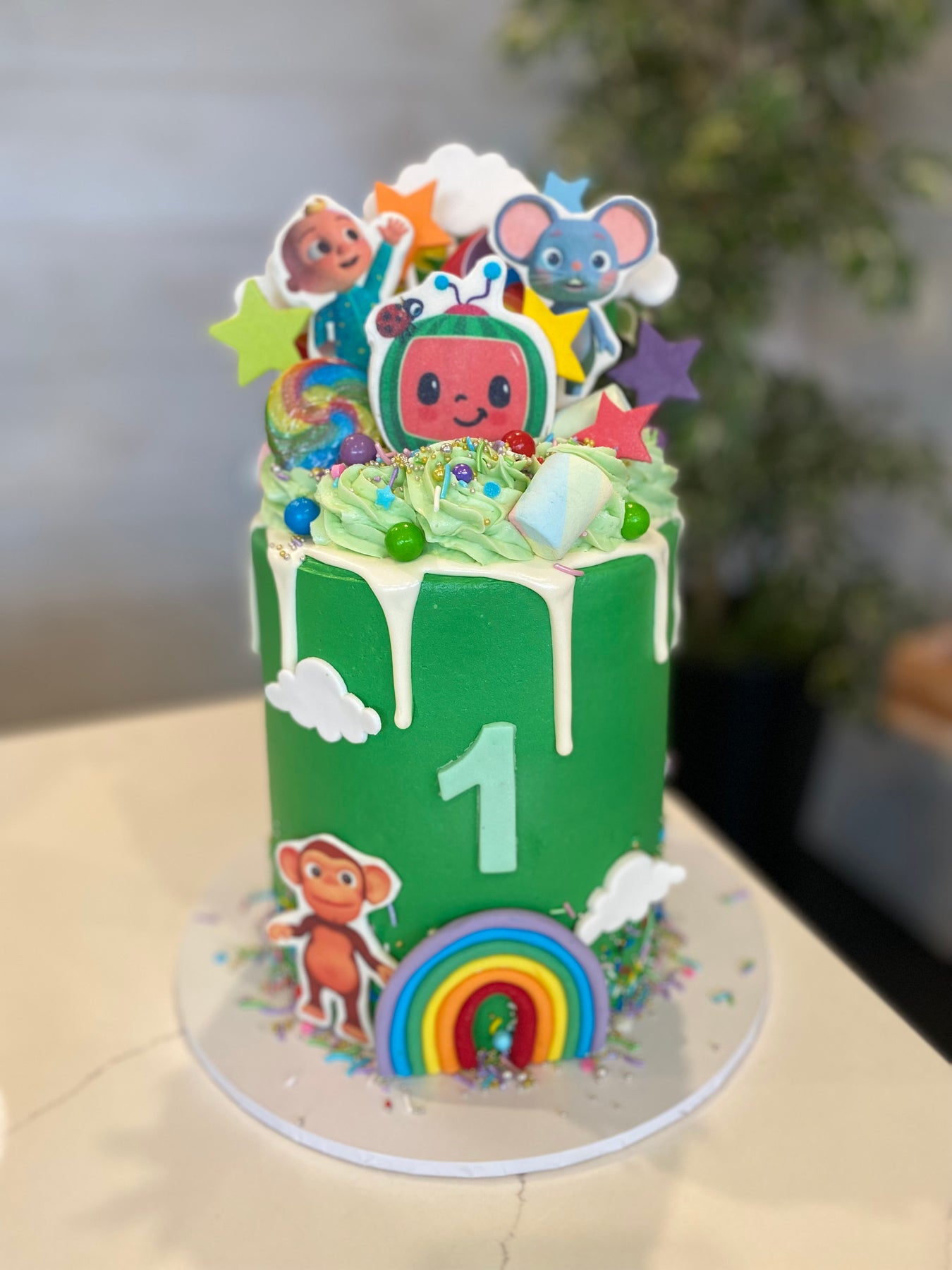 Coco Melon Drip cake – The Cupcake Factory