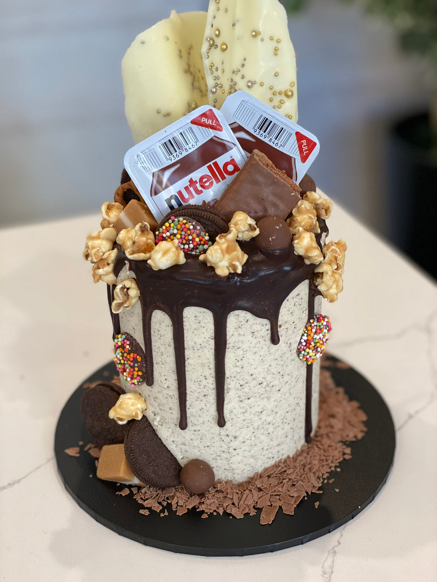 Nutella drip cake – The Cupcake Factory